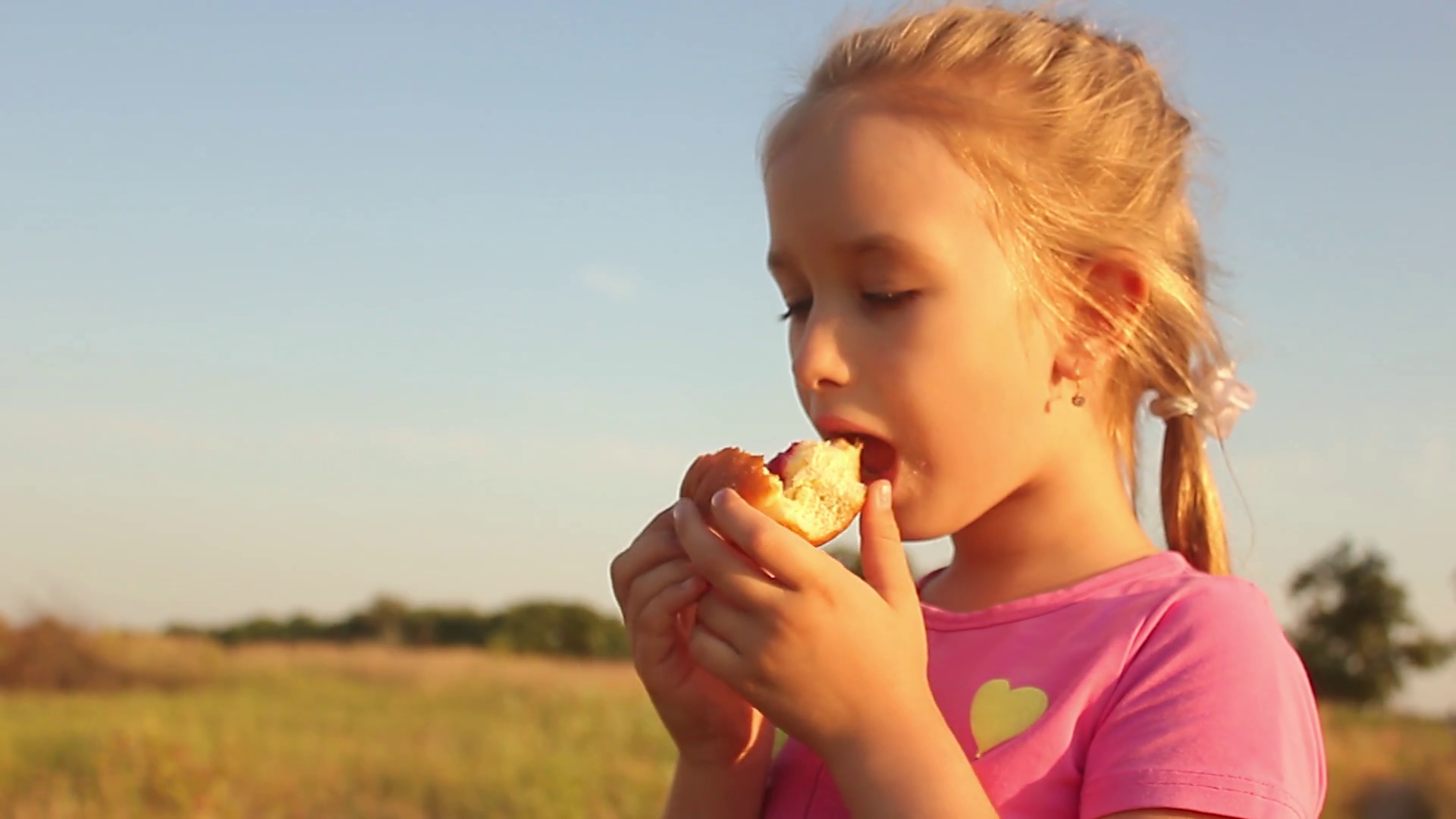 Girl Eating A Donut Wallpaper Photos