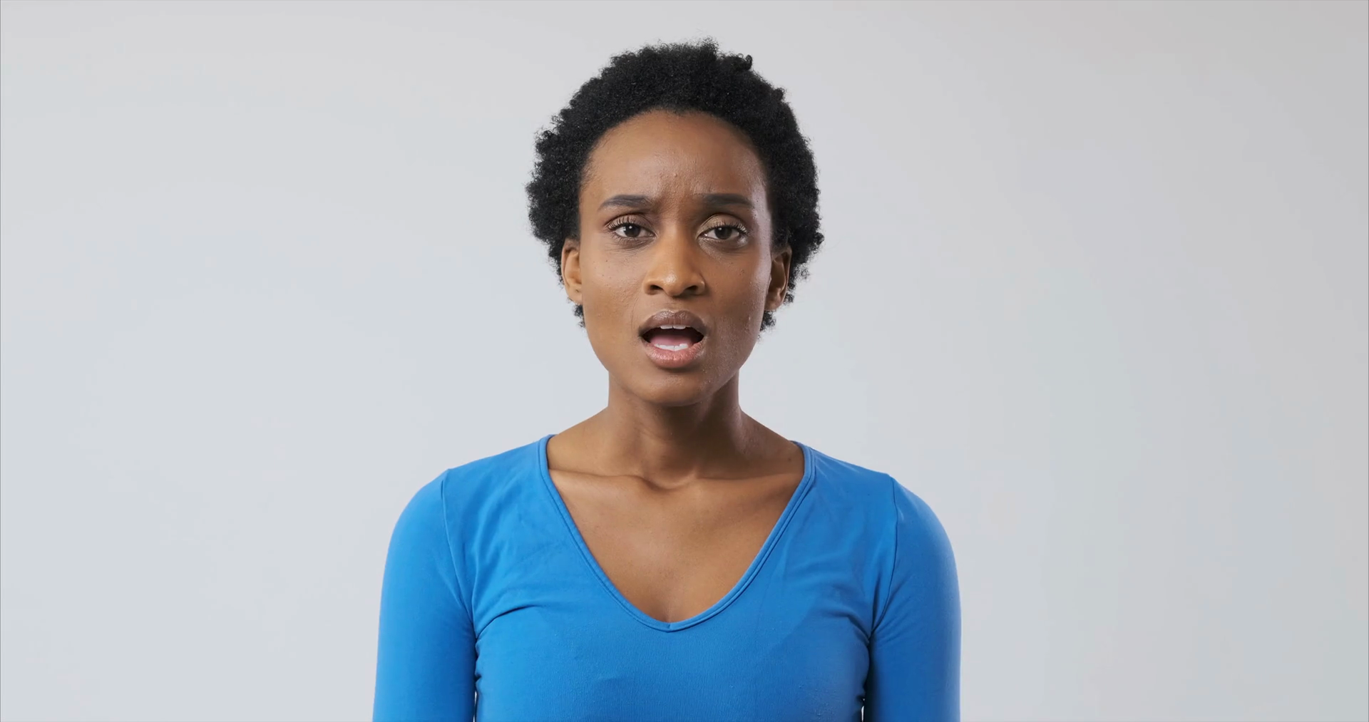 Shocked African American Woman Over White Background Stock Video