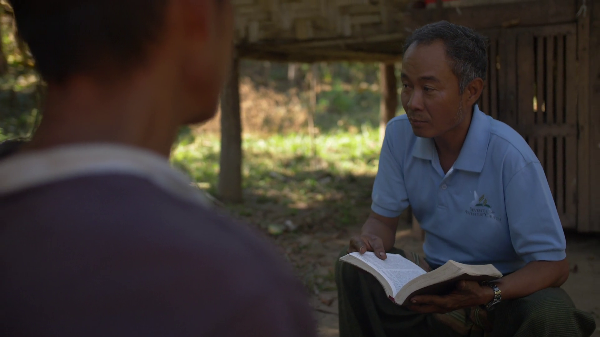 Asian Missionary Giving Bible Study In Jungle Stock Footage Sbv