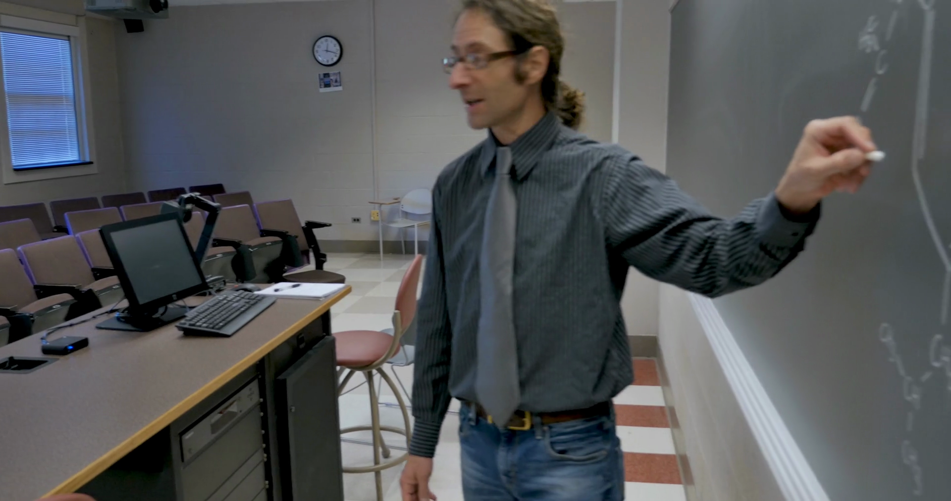 Professor Using Chalkboard To Teach Science Stock Footage Sbv 334415535