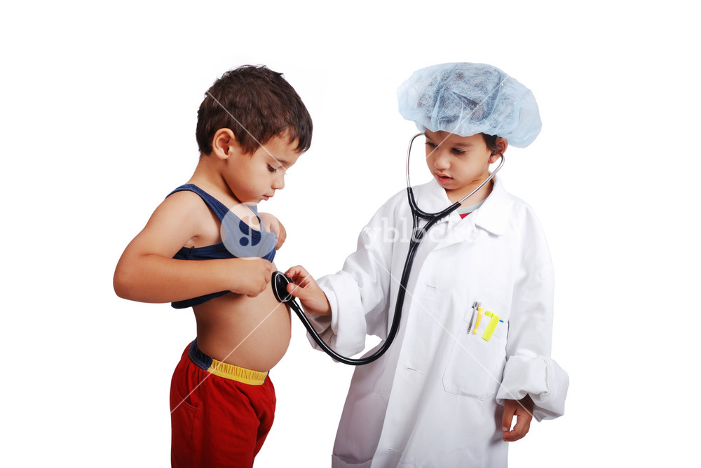 Compassionate Doctor Examining Young Patient Royalty Free Stock Image