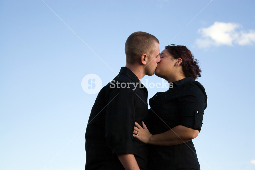 A Young Happy Couple Gazing Into Each Others Eyes Royalty Free Stock