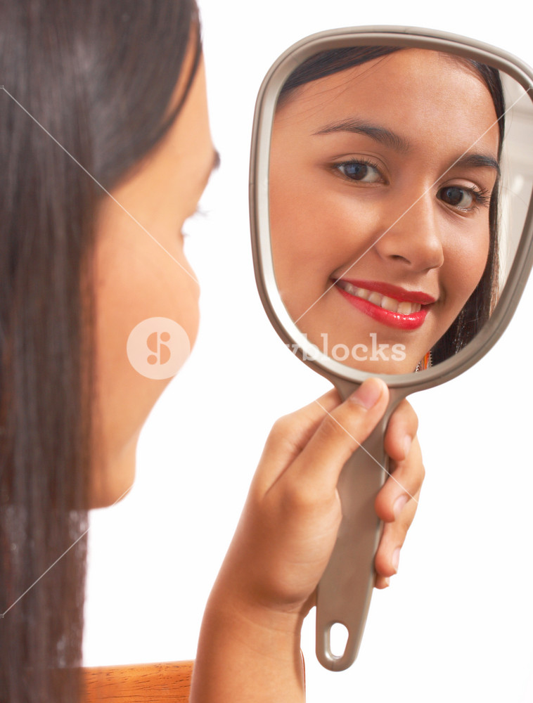 Girl Looking In The Mirror