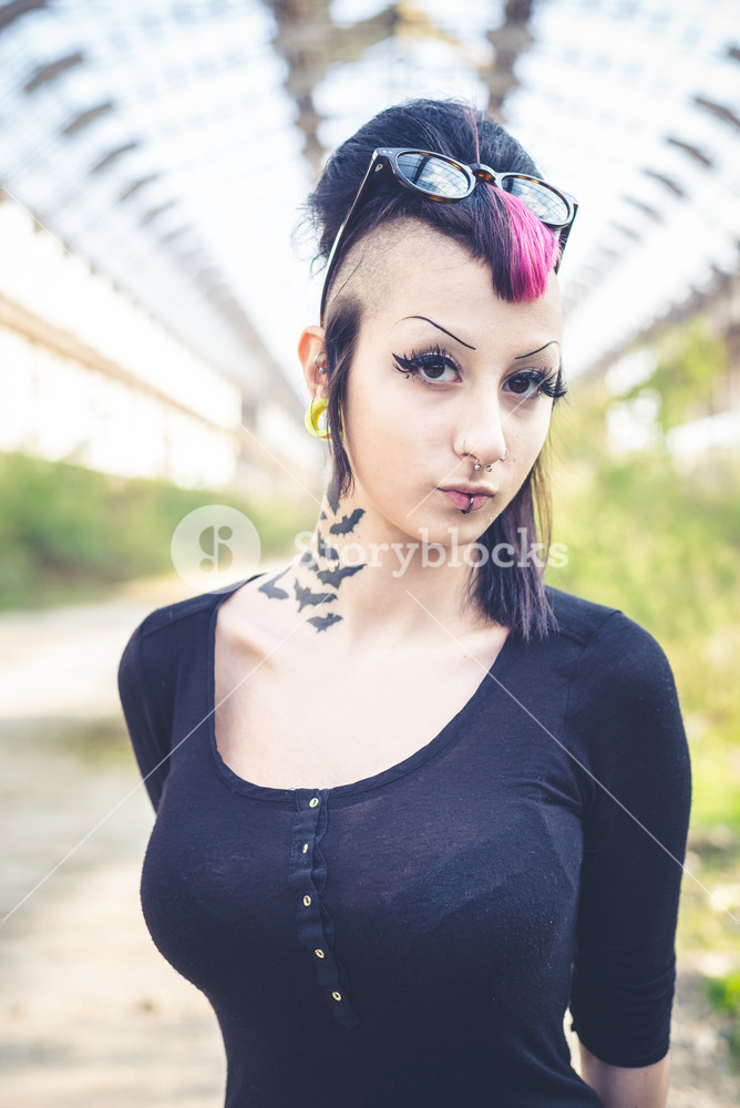 Young Beautiful Punk Dark Girl In Urban Landscape Royalty Free Stock