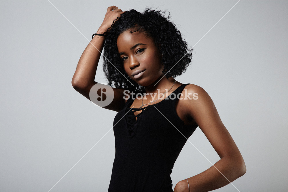 Young Black Mixed Race Woman With Short Curly Hair Stuido Portrit