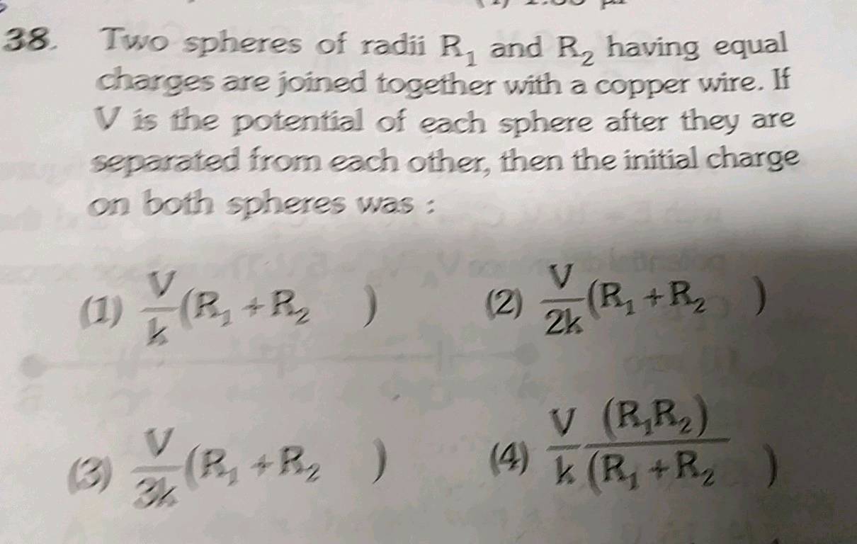 Two Insulated Charged Spheres Of Radii R1 And R2 Having Charges Q1 And