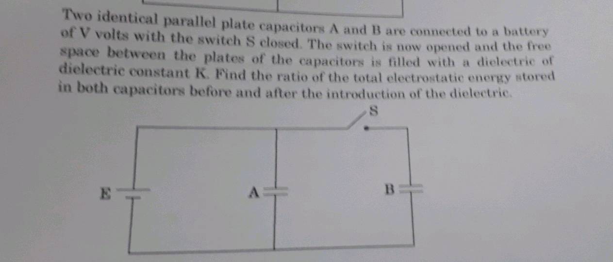 The Figure Shows Two Identical Parallel Plate Capacitors Connected To A