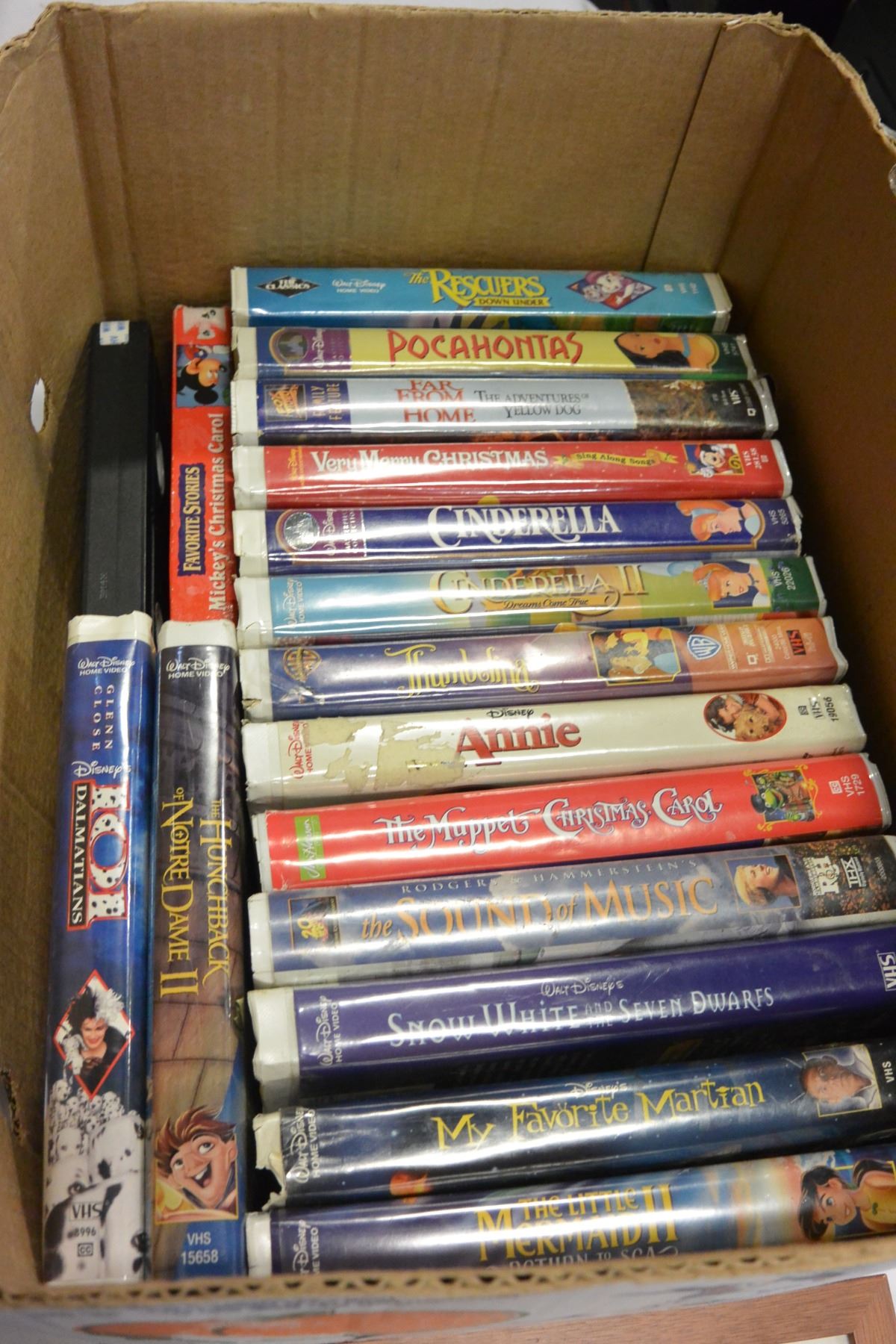 Box Lot Of Disney Vhs Tapes And Disney Print Big Valley Auction