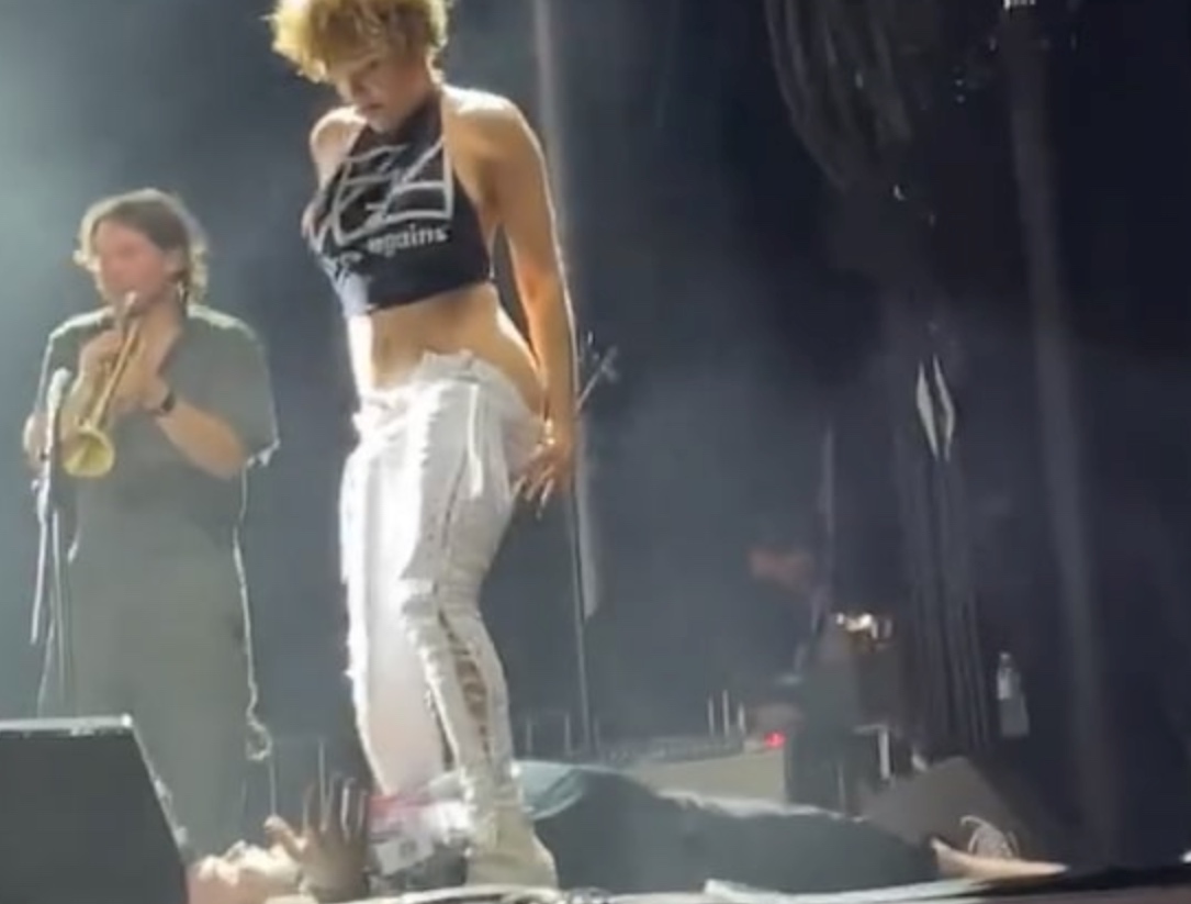 Band Apologizes For Singer After She Pees On Fans Face During Concert