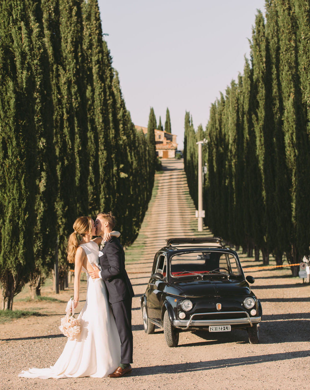 An Intimate Tuscan Wedding Featuring A Hillside Reception Under