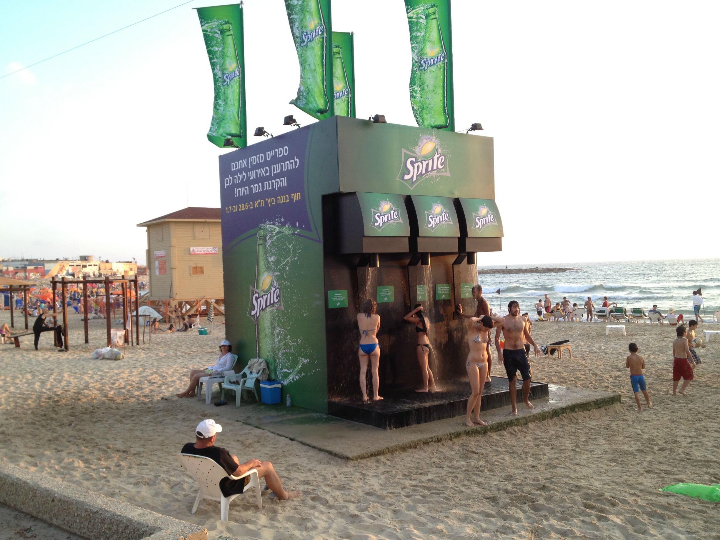A Beach Shower That Looks Like A Giant Sprite Machine