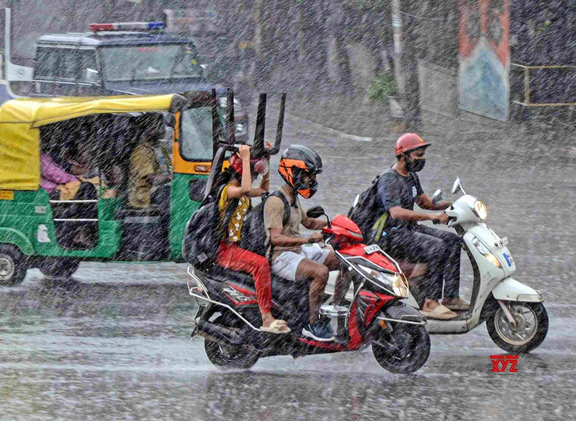 Bengaluru Vehicle Ply On Road As Heavy Rain Lashes In Bengaluru