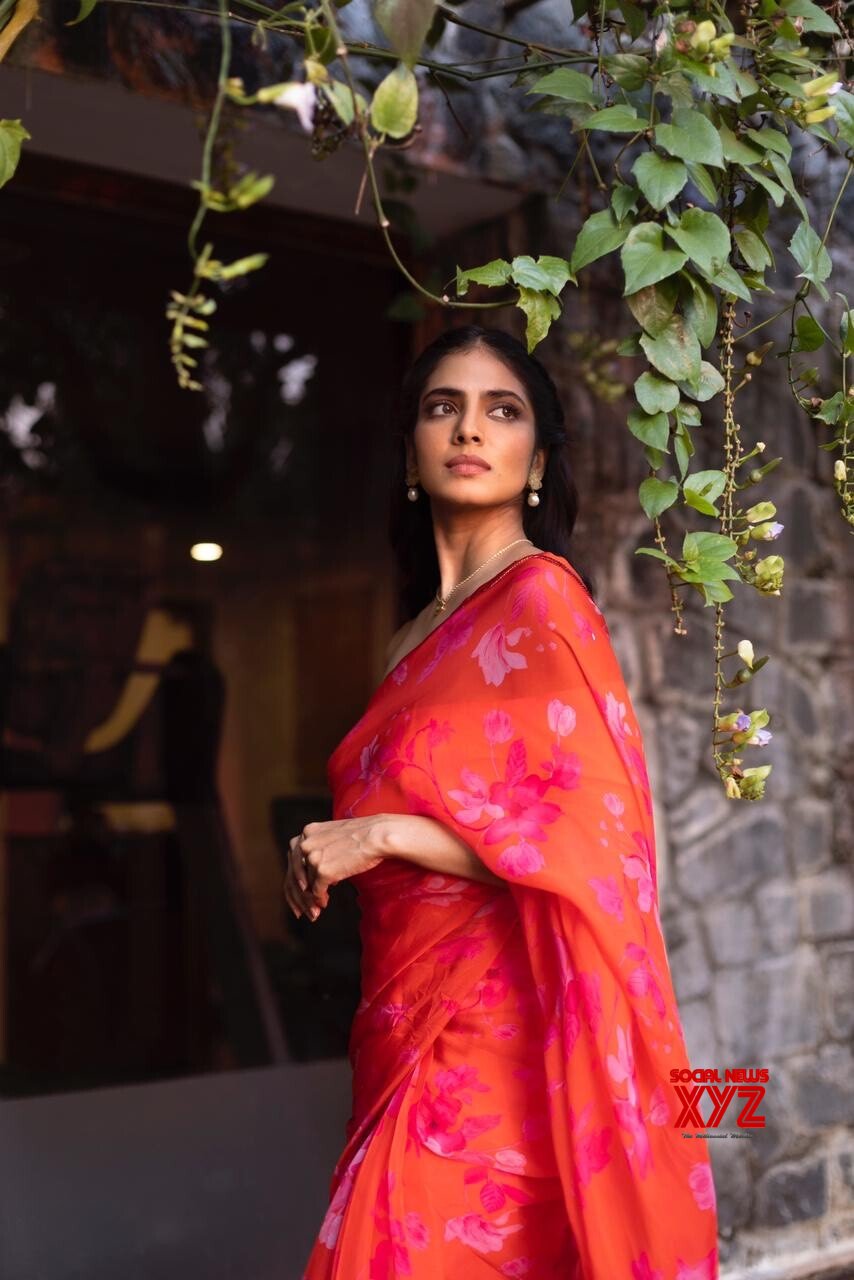 Actress Malavika Mohanan Looks Dreamy In A Red Sari For Her Movie