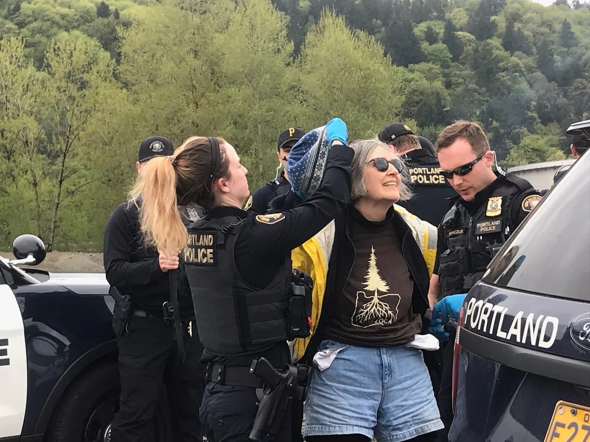 Portland Police Arrest Protesters Blocking Oil Train Tracks With A