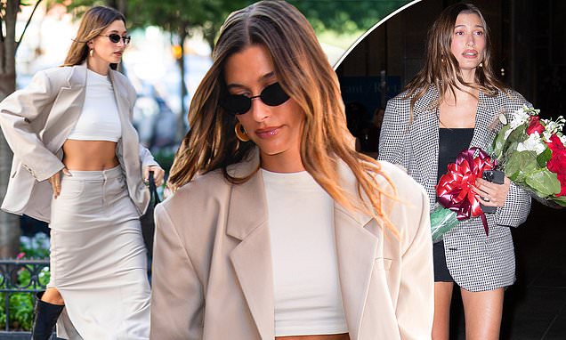 Hailey Bieber Shows Off Taut Tummy In A Crop Top As She Steps Out In