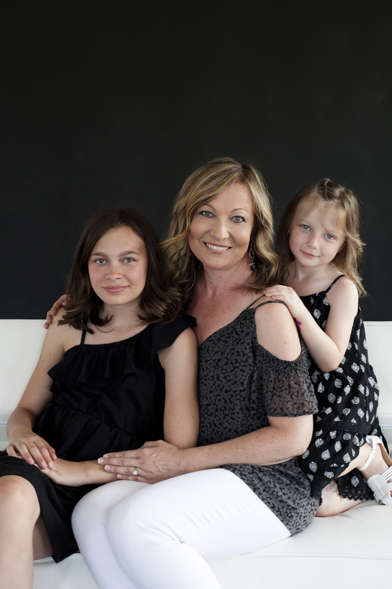 Mother And Daughters Studio Portrait