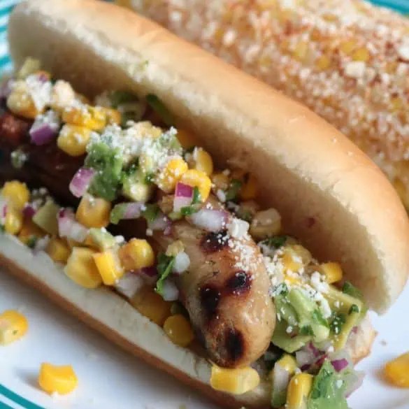 Mexican Hot Dogs With Corn Salsa And Chipotle Cream