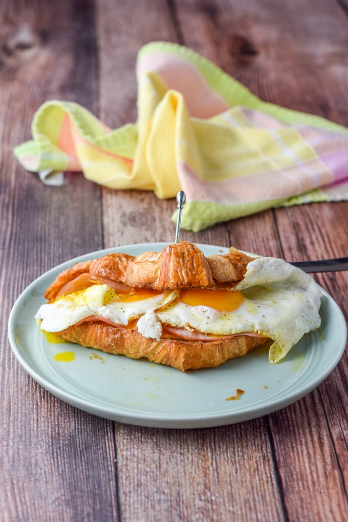 Croissant Sandwich With Ham Eggs And Cheese Dishes Delish