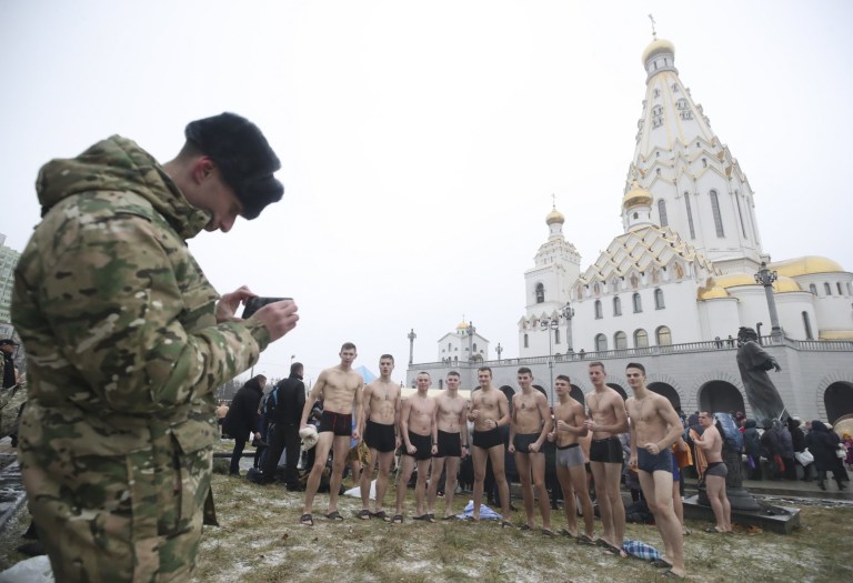 Orthodox Christians Plunge Into Freezing Ice Baths For Epiphany Metro
