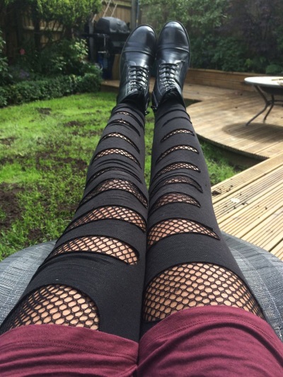 How To Wear Fishnet Tights With Literally Everything