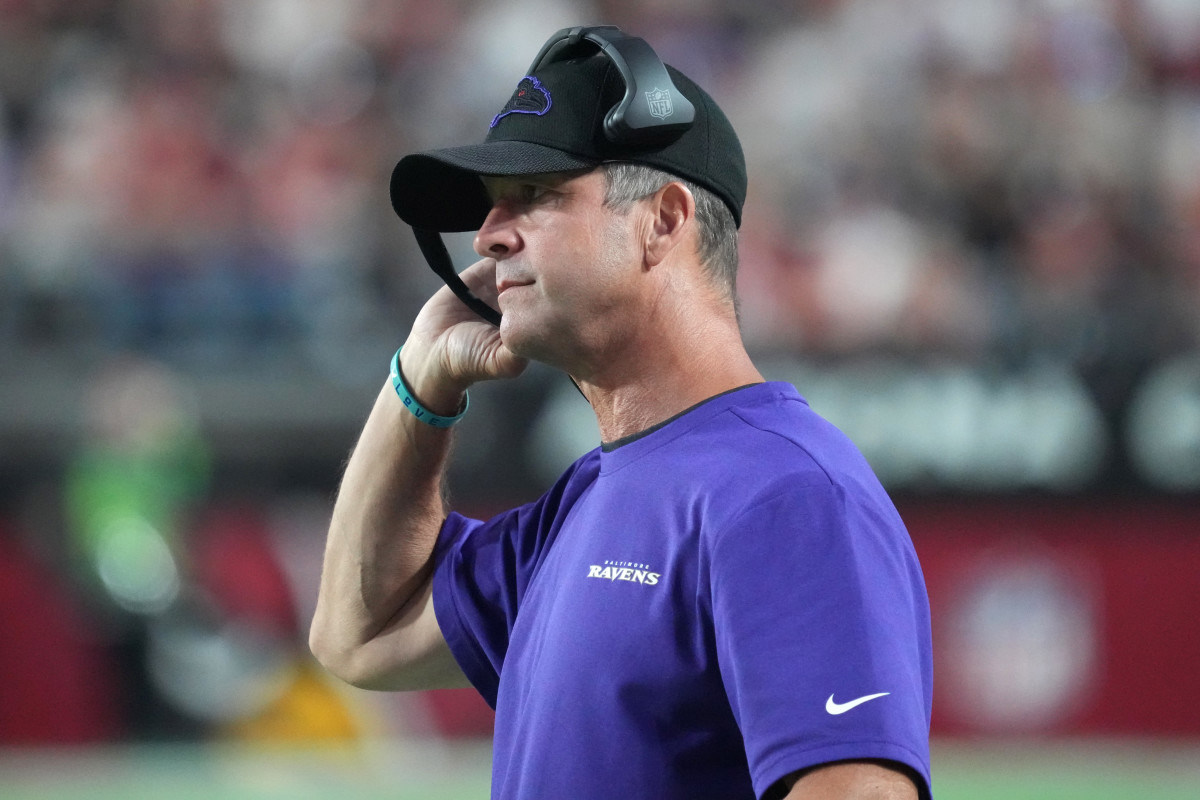 Ravens John Harbaugh Surprises Brother Jim Harbaugh During Cfp