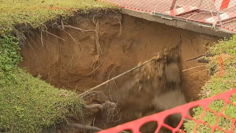 Polk County Home Evacuated After Large Sinkhole Opens In Front Yard