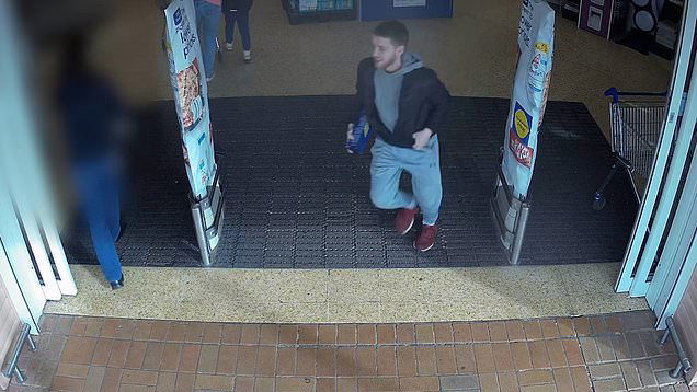 Shoplifter Fails To Hide Booze Under Top Moments Before Legging It