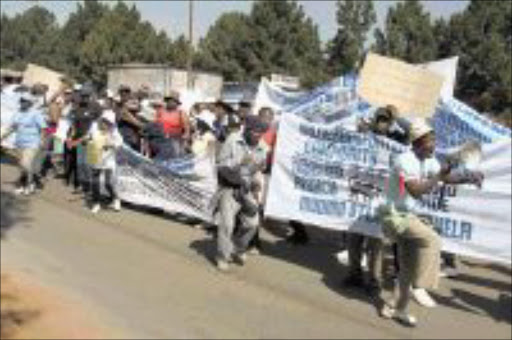 Residents March Against Illegal Evictions