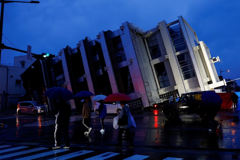 Japan Quake Survivors Face Freezing Rain