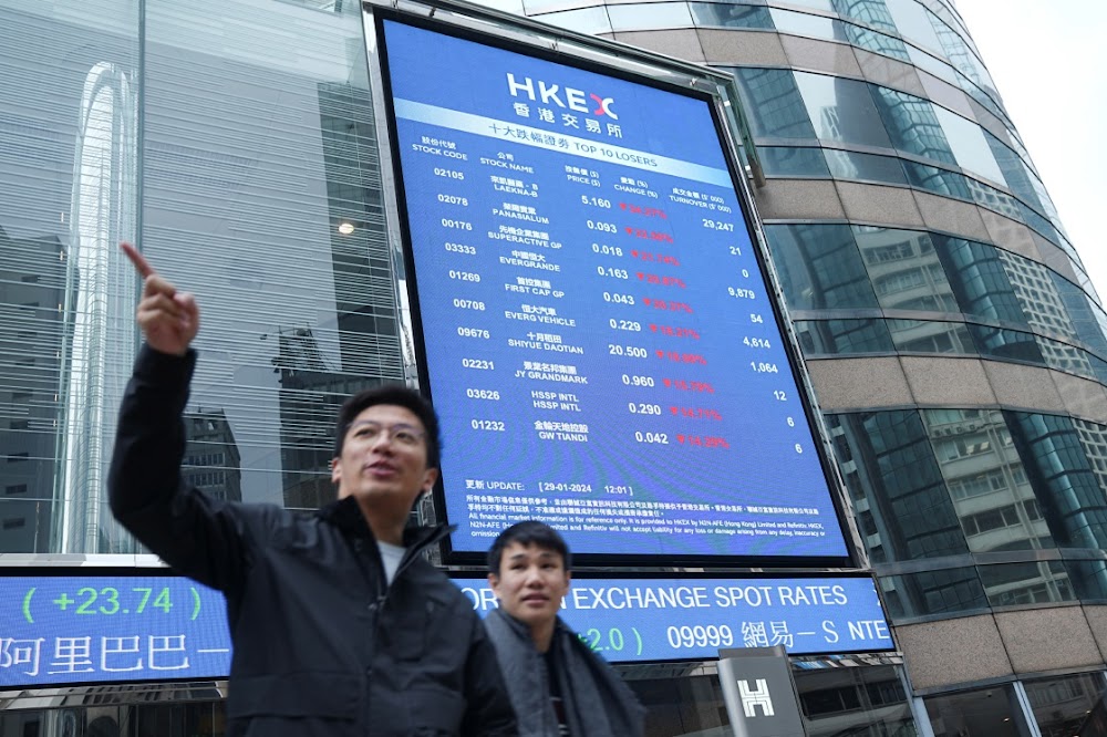 Chinese Shares Drag Asian Peers Down