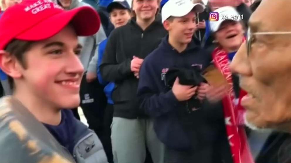 Maga Hat Wearing Teens Mock Indigenous Elder