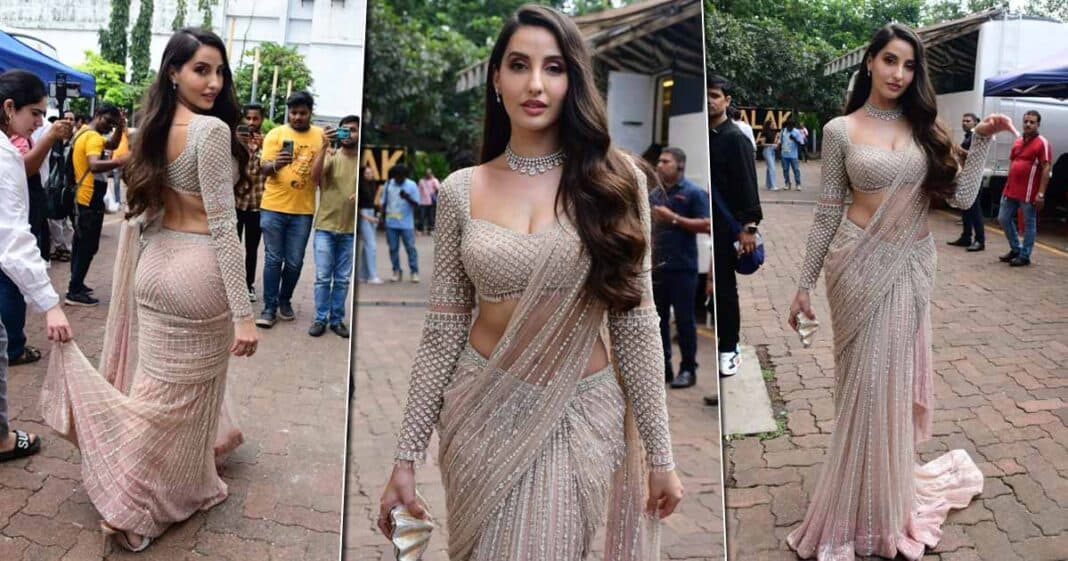 Nora Fatehi Stuns In A Sheer Sequin Blush Pink Saree And Flaunts Her